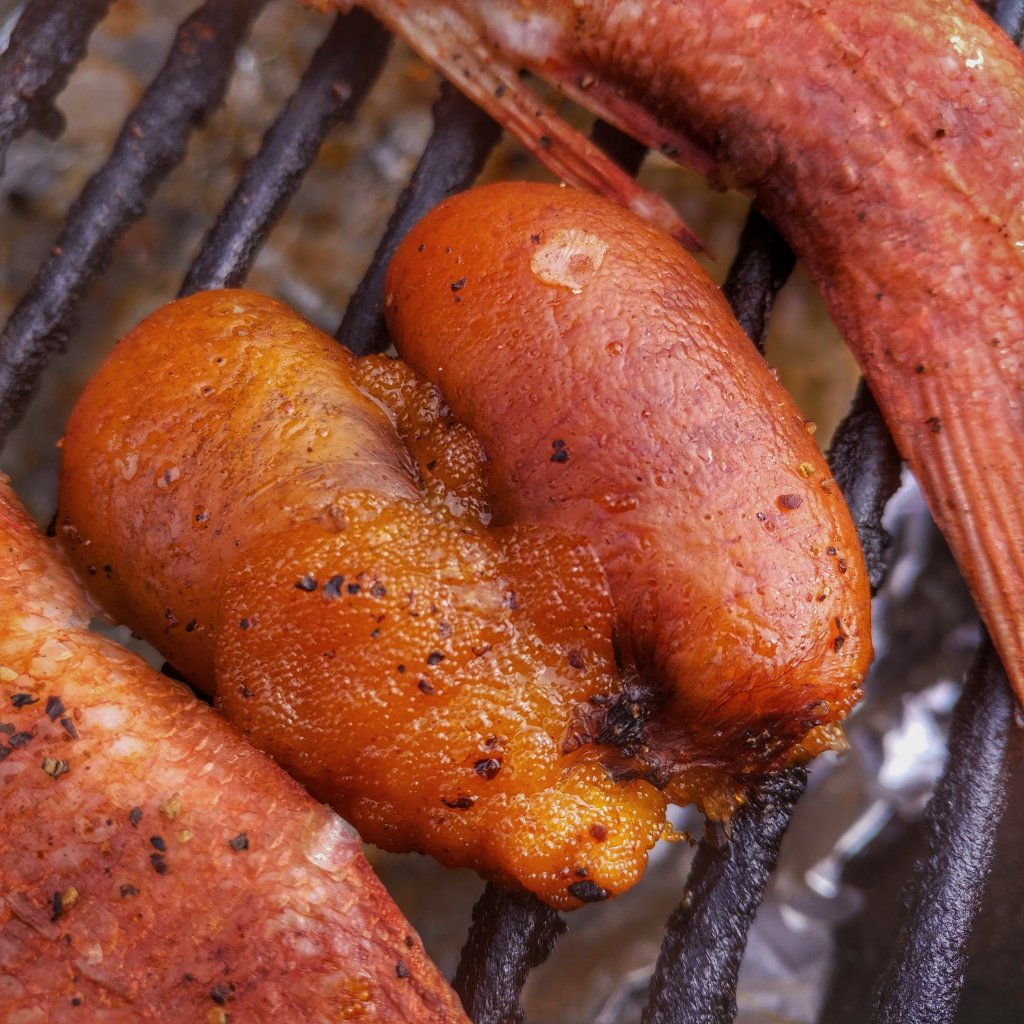 Tail of the redfish being prepped for the @webergrills performer. A www ...